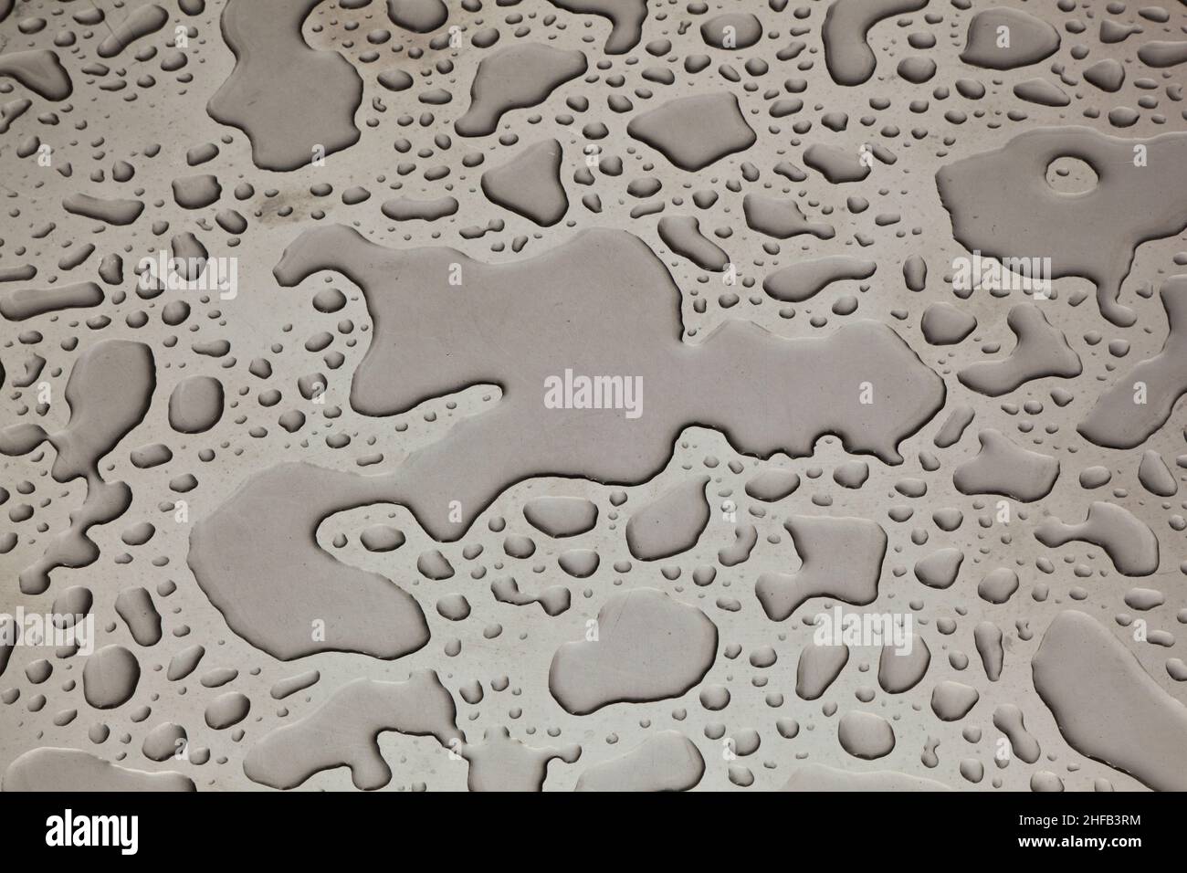 water on silver table gives a harmonic pattern and fantasy creates ...