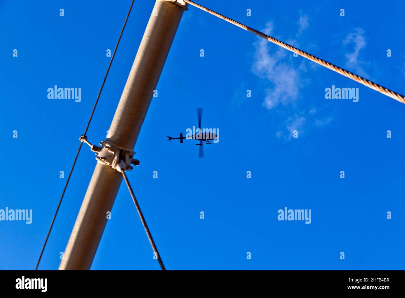 helicopter overflying famous Brooklyn Bridge in New York Stock Photo ...