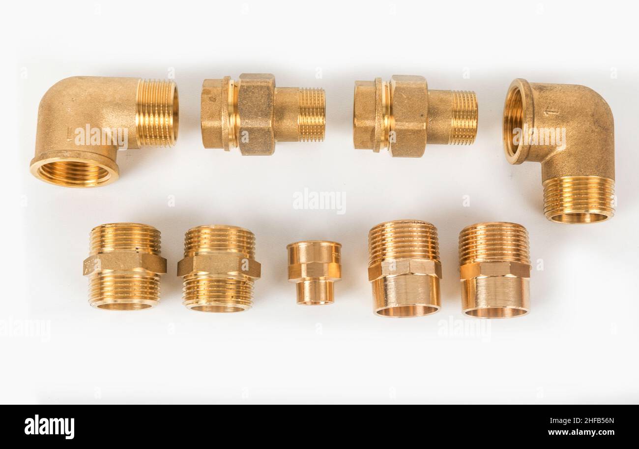 Brass fasteners for use in heating. fasteners and fittings on the white ...