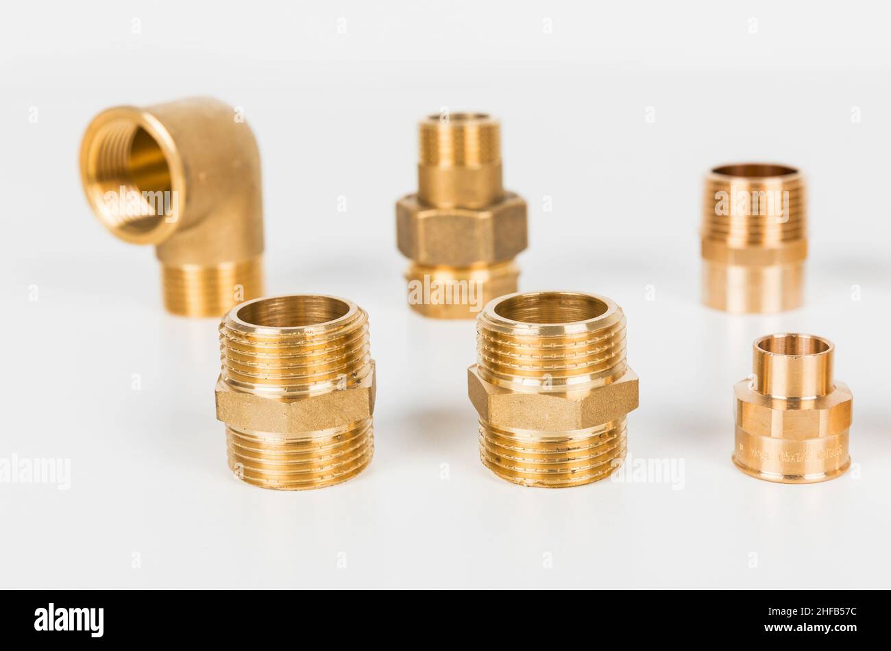 Brass fasteners for use in heating. fasteners and fittings on the white ...