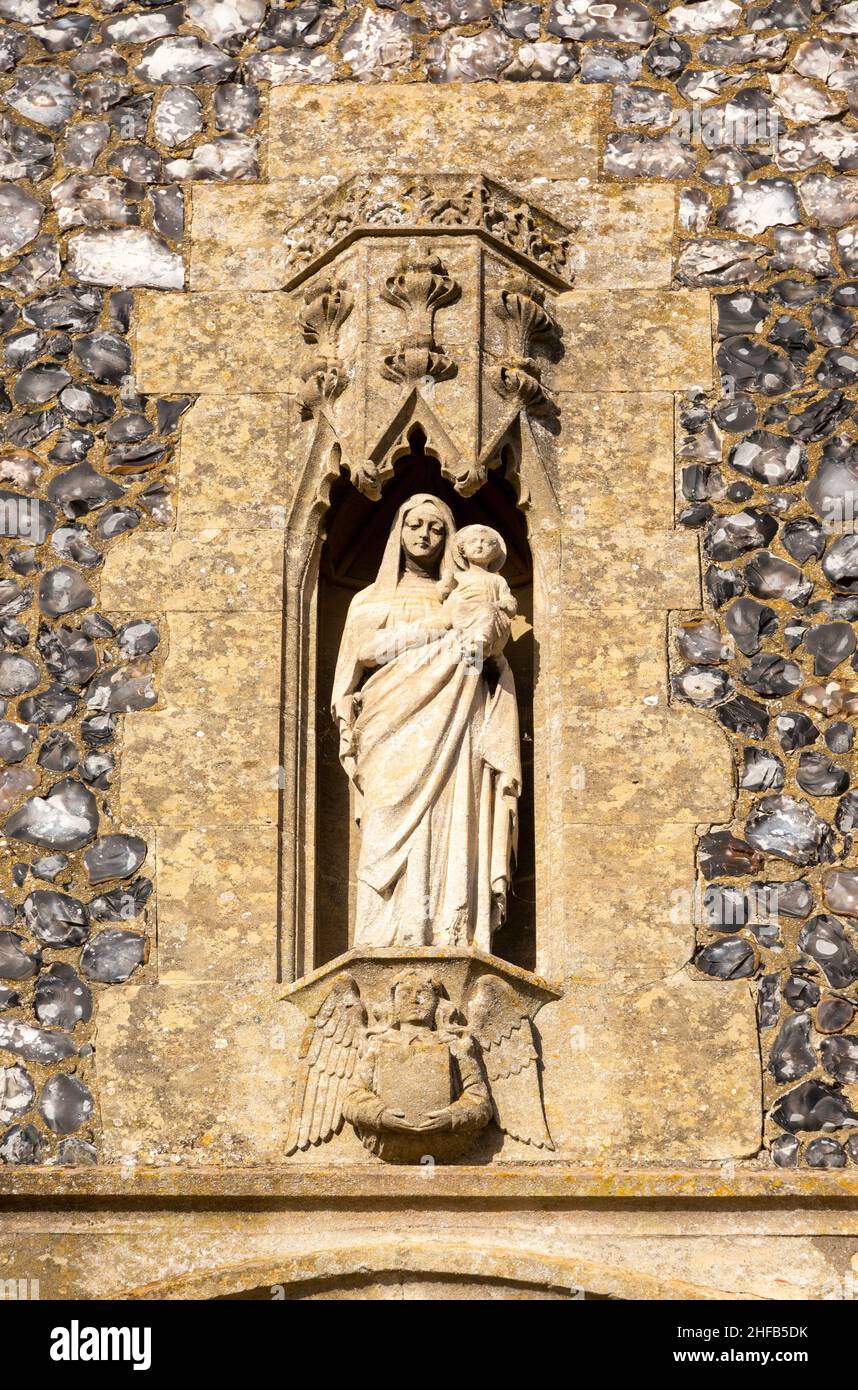 Statue of Mary and baby Jesus Christ in niche above porch, Capel St ...