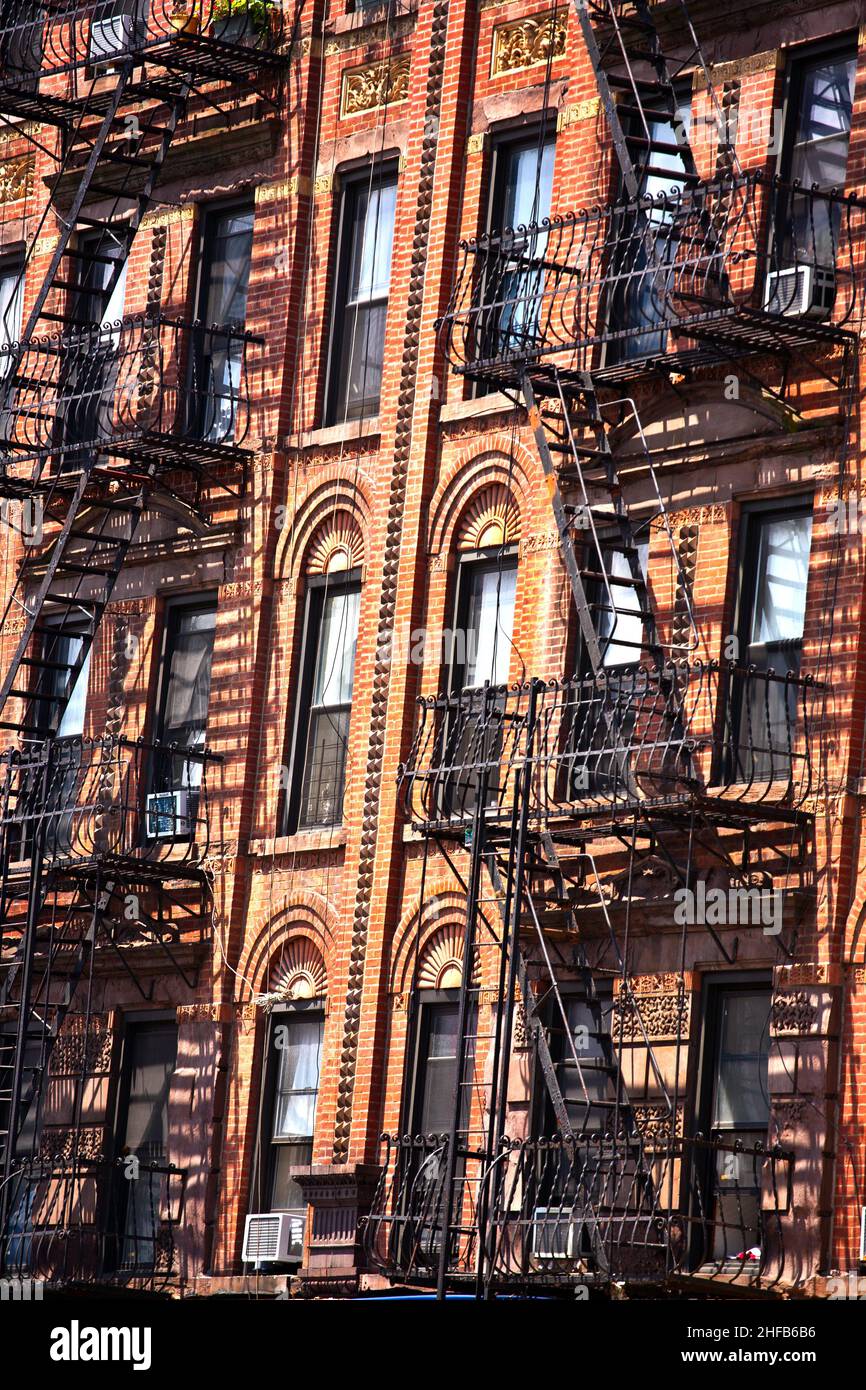 fire ladder at a facade of an old brick house in New York Stock Photo ...