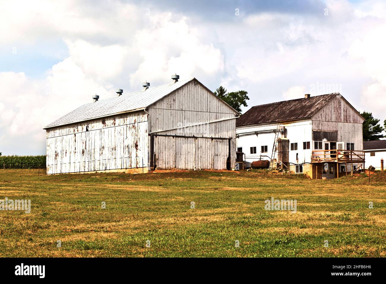 farm house with field and silo in beautiful landscape Stock Photo - Alamy