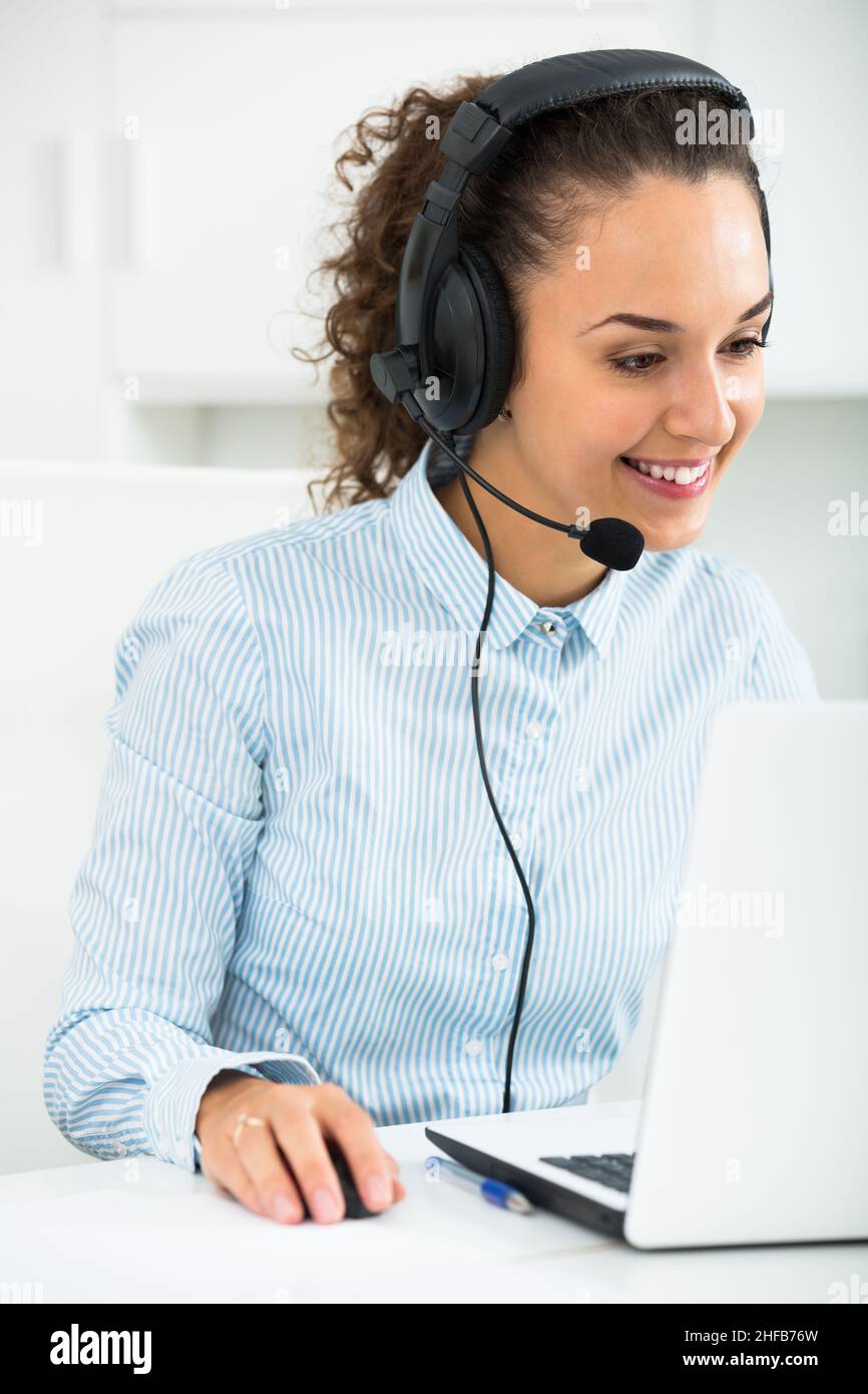 Portrait of young girl working in call center Stock Photo - Alamy
