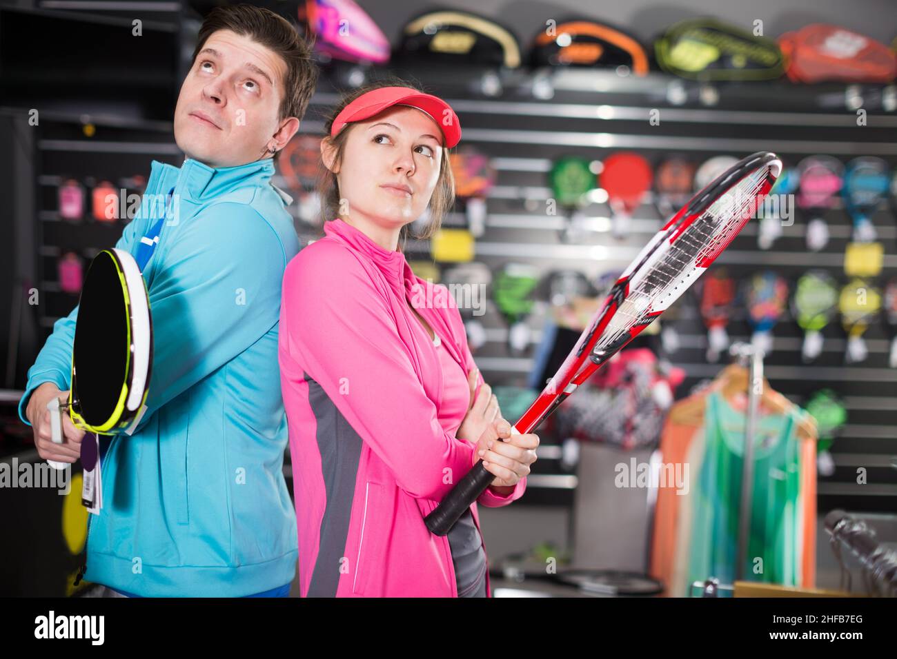 Sports players is demonstraiting rackets Stock Photo - Alamy