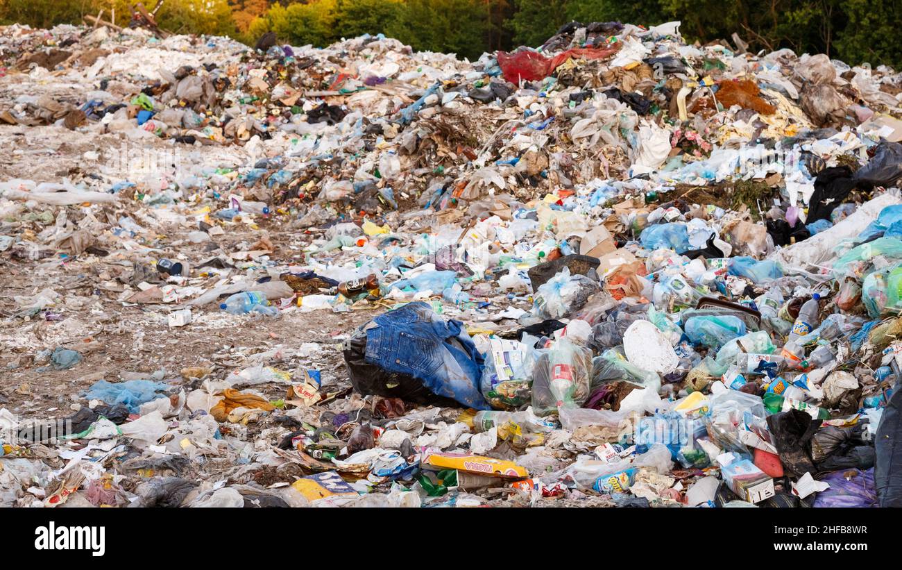 Junkyard Of Domestic Garbage. Large Heap Of Garbage Stock Photo - Alamy