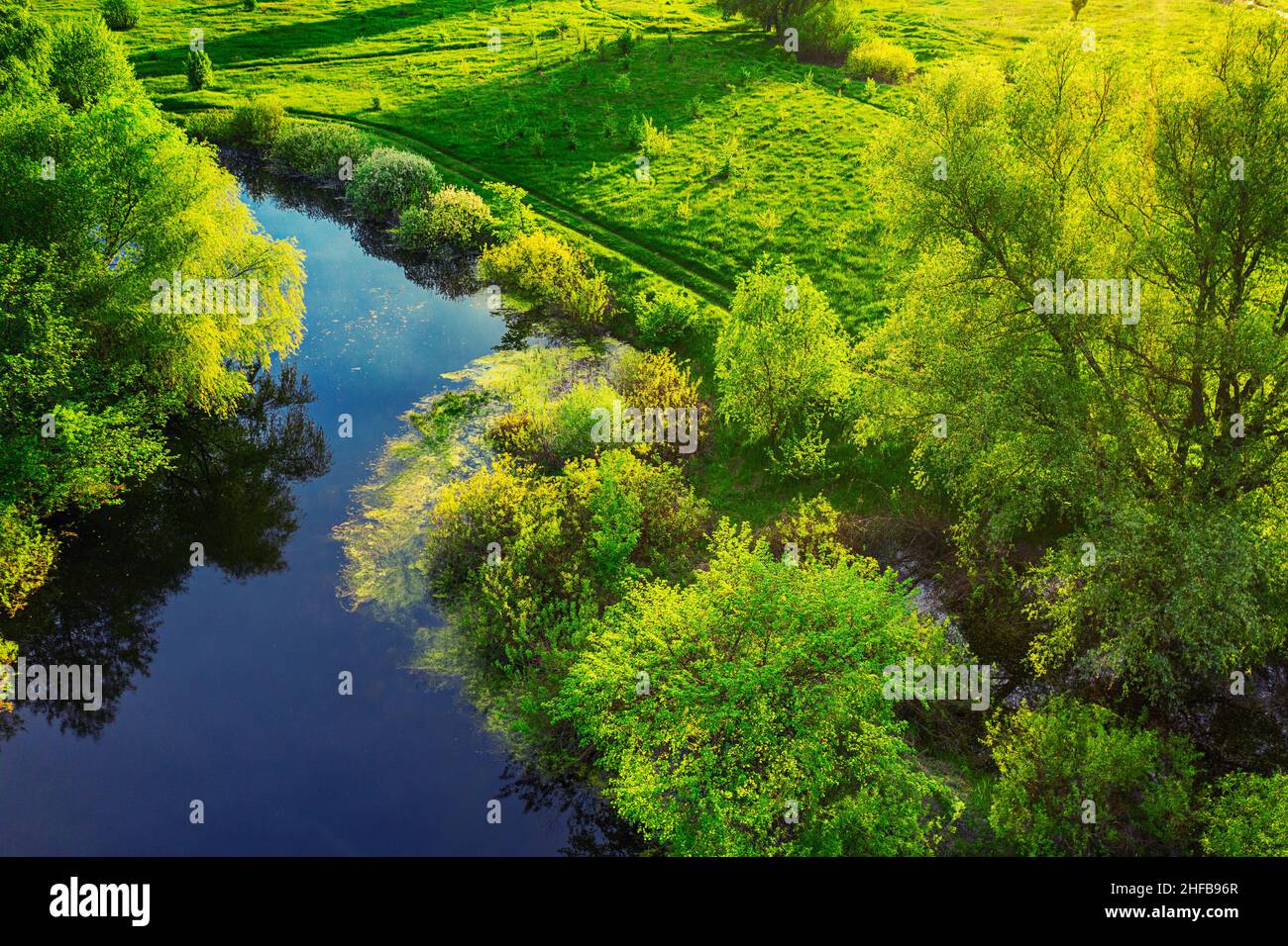 Spring landscape with river Stock Photo - Alamy