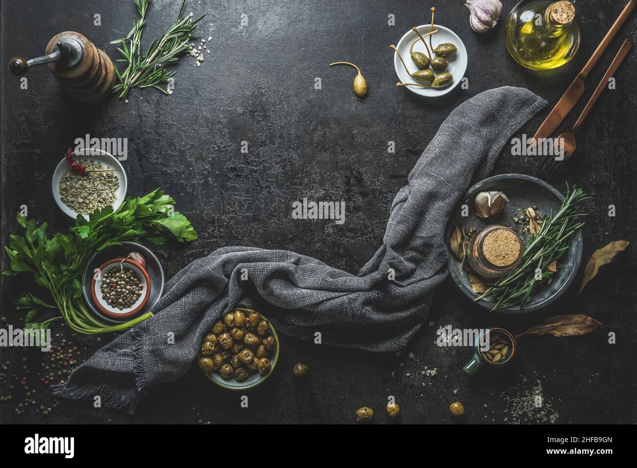 Mediterranean food background with olives, oil, parsley, rosemary ...