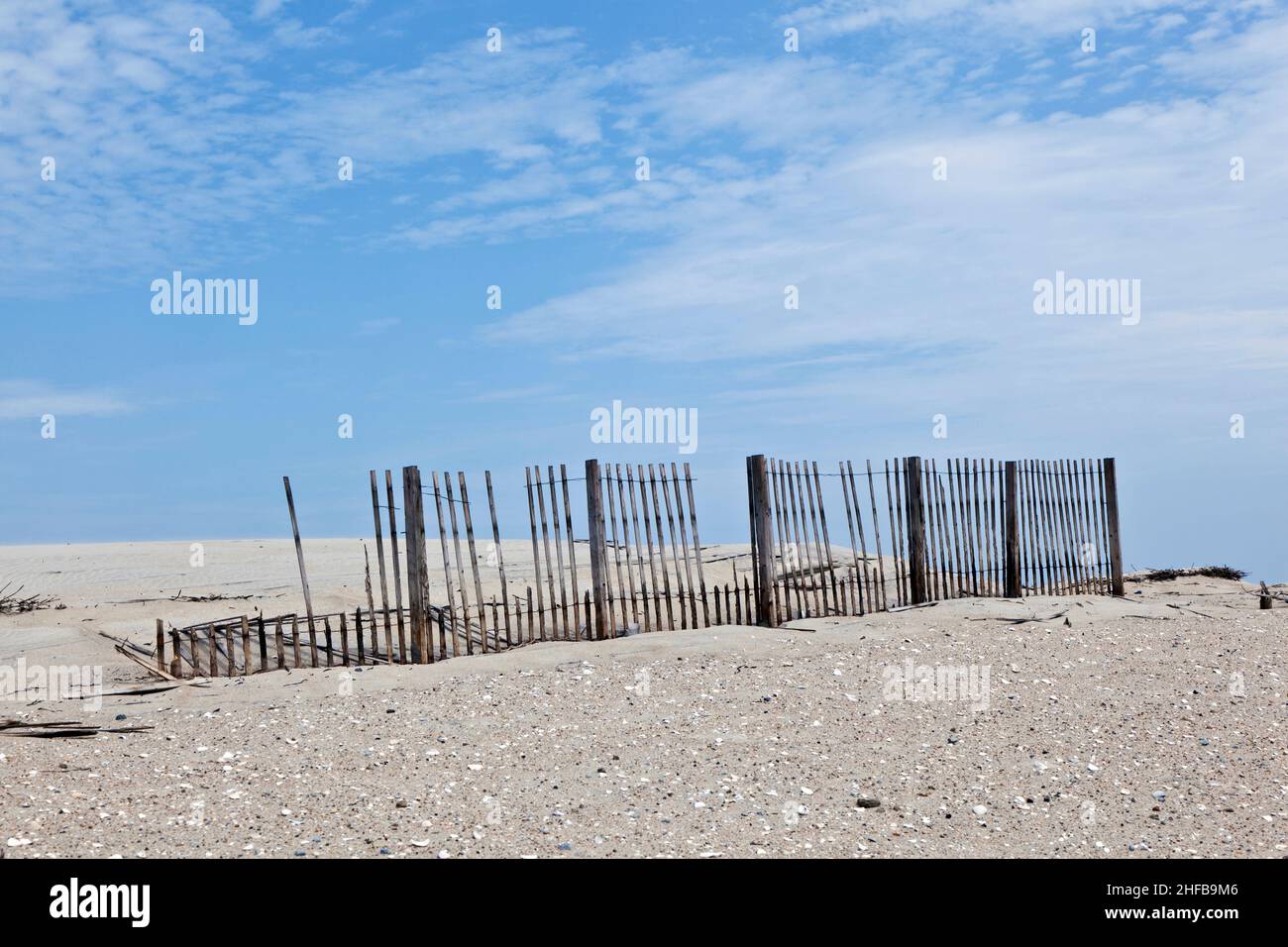 fence for protection of the dunes at the beautiful natural beach ...