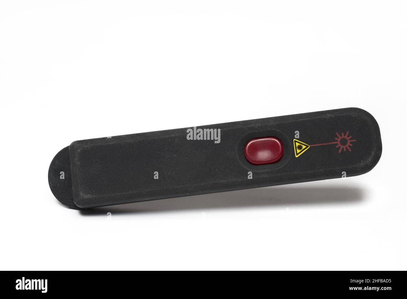 Close-up of a dark laser pointer for use in presentations on a white ...