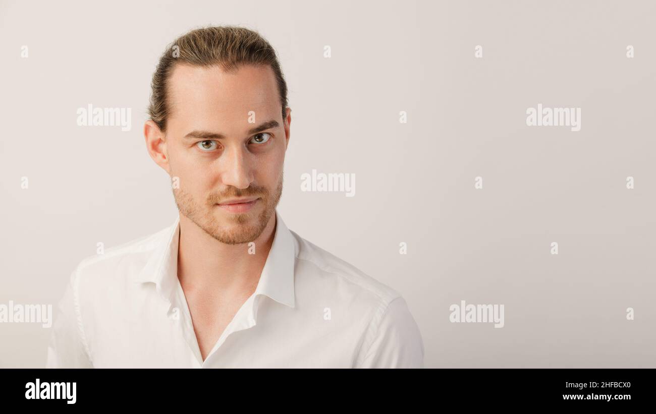 Young Blonde Bearded Man Looking In Camera Portrait Of Caucasian Guy