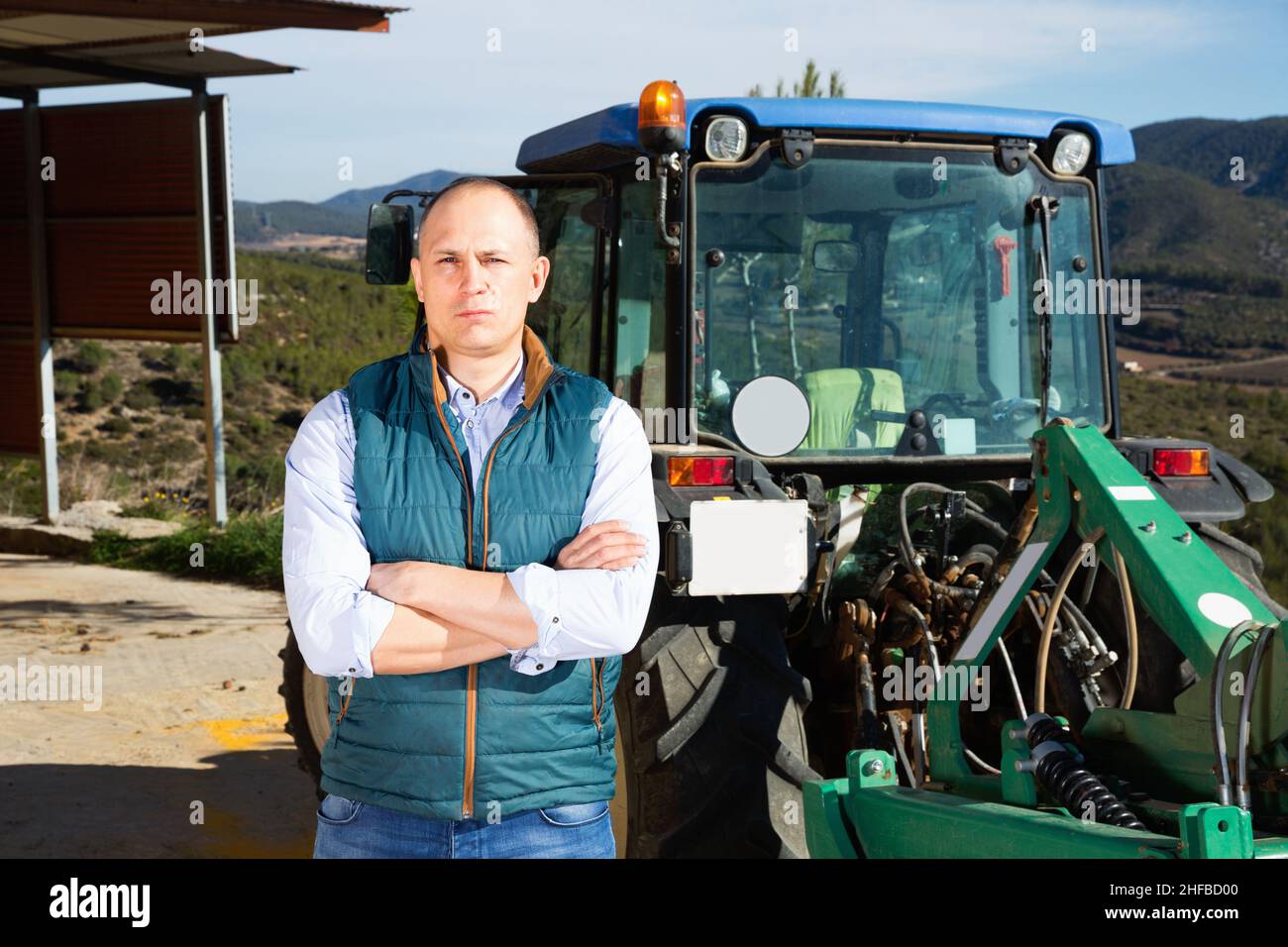Farmer posing with tractor hi-res stock photography and images - Alamy
