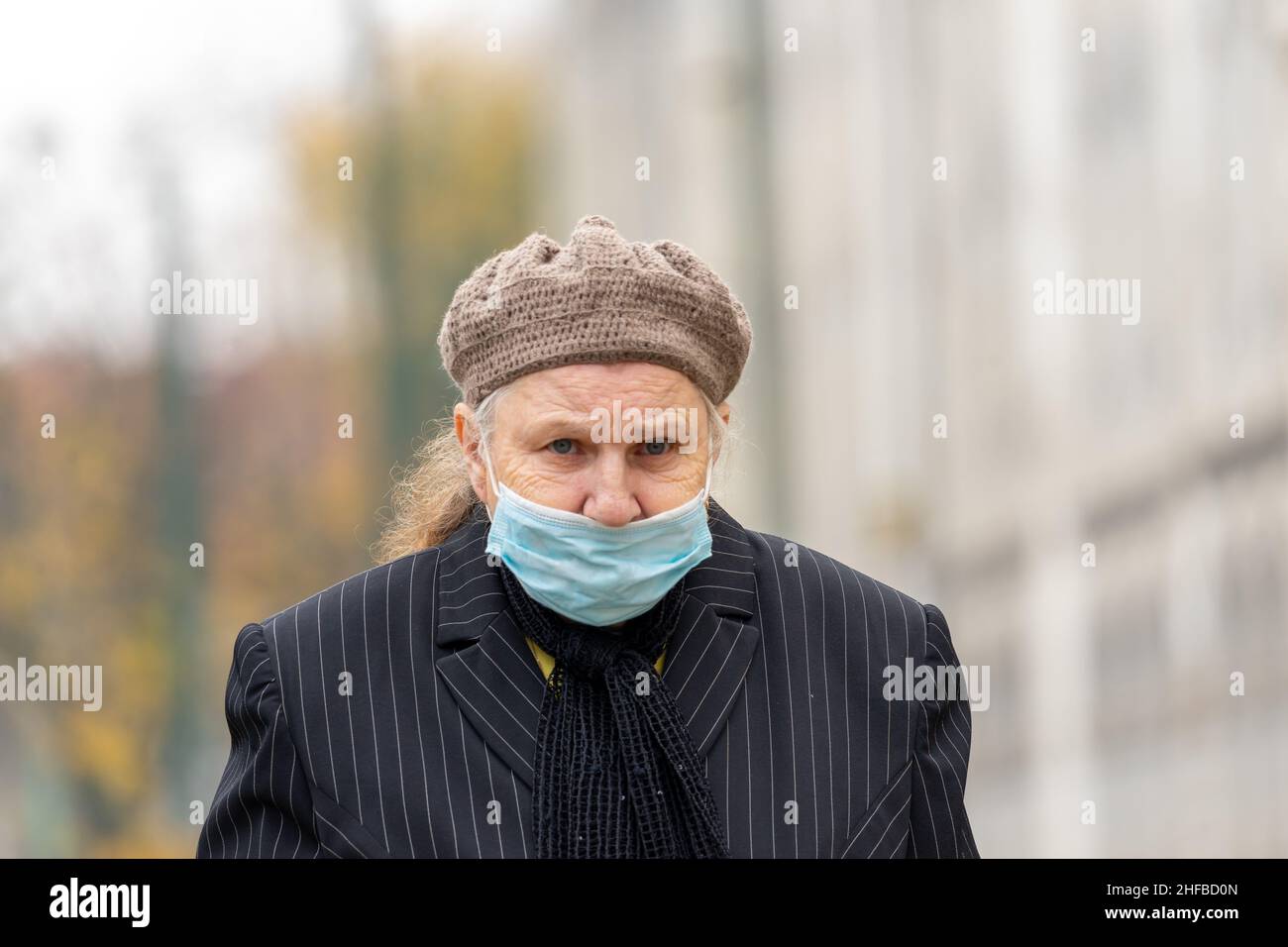 Timisoara, Romania - November 07, 2021: Portrait of a woman walking on ...