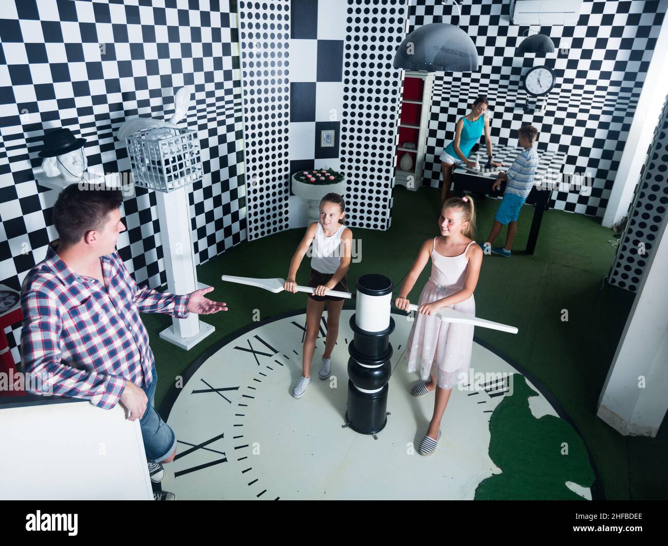 Portrait of family who is visiting the lost room Stock Photo - Alamy
