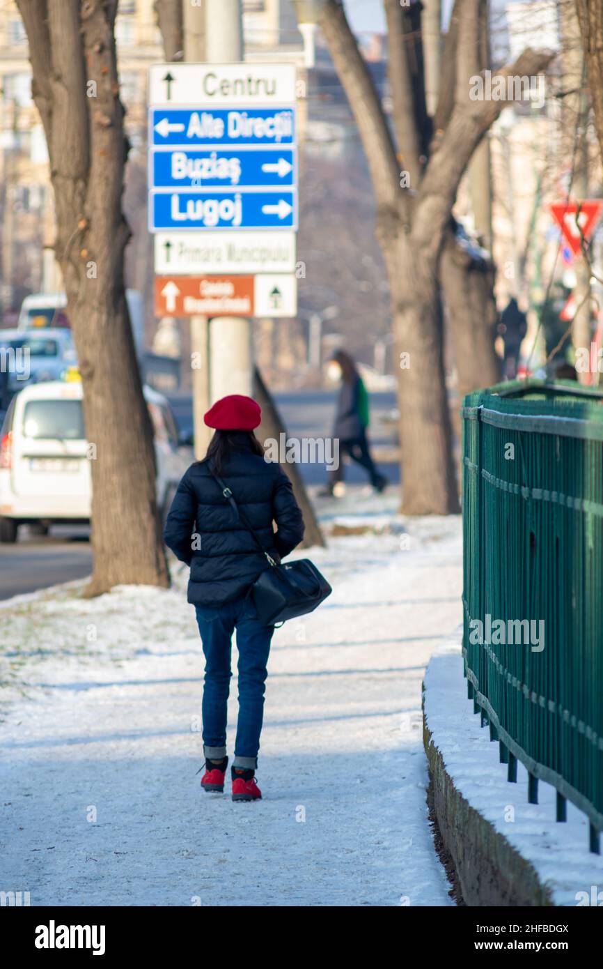 Woman walking on the street. Real people Stock Photo - Alamy