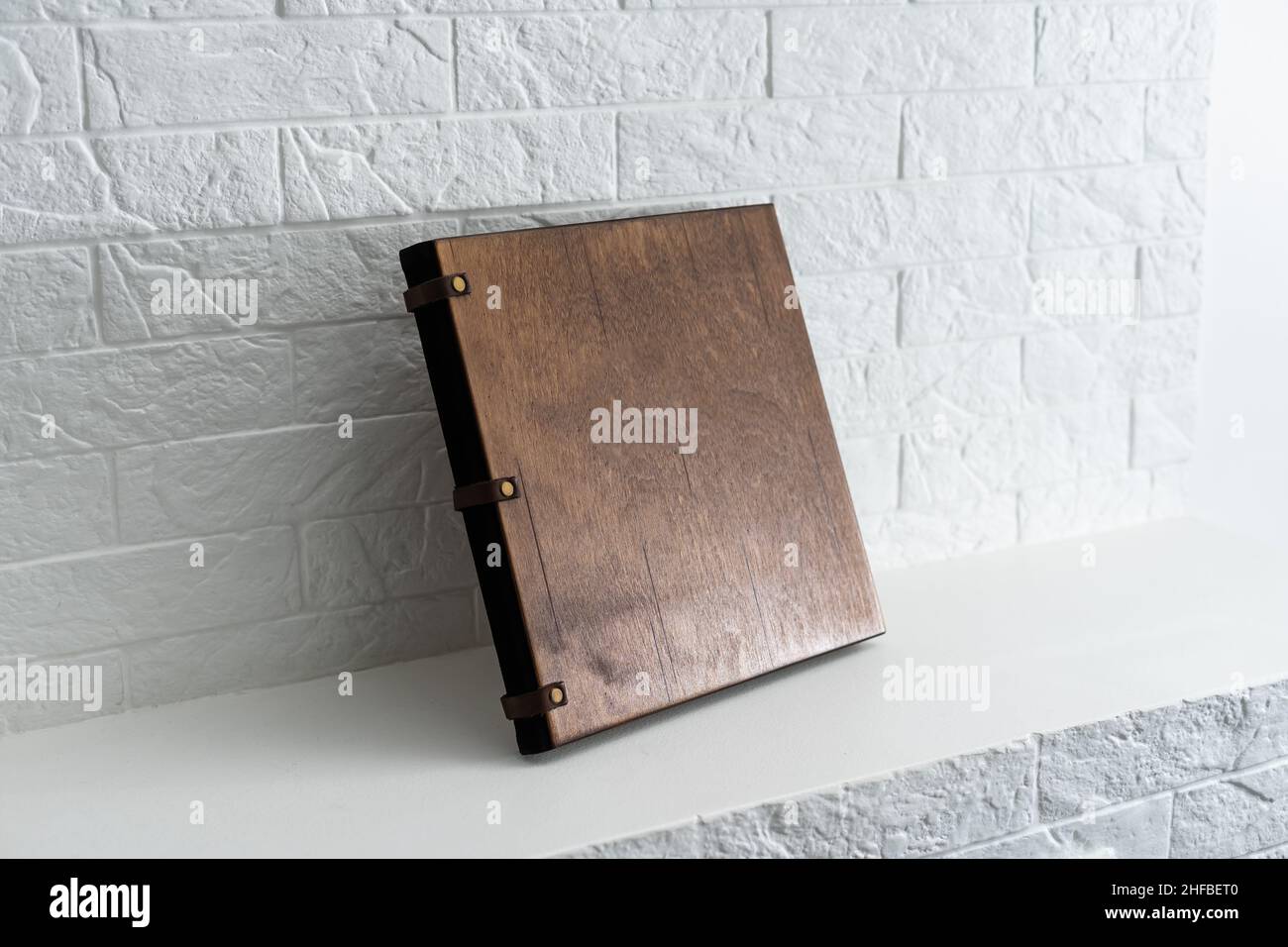 photo book with wooden cover. unfolded photobook. sample photobook ...