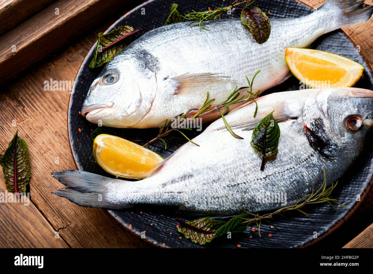 Healthy fresh fish, dorado and cooking spices Stock Photo - Alamy