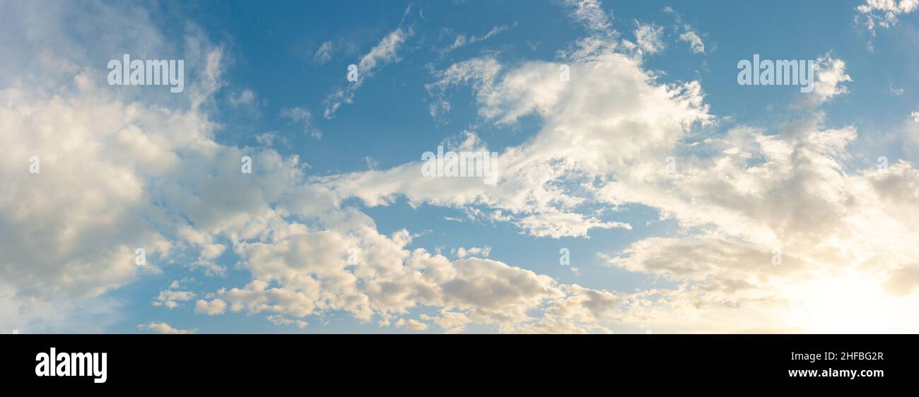Scenic sky background with sunlight and clouds. Beautiful panoramic ...