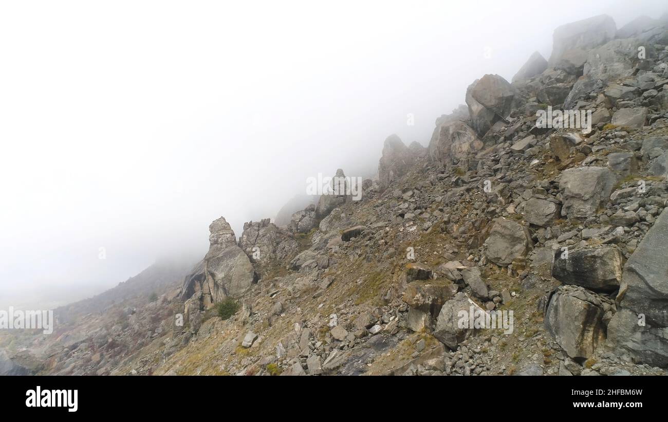Aerial view on Mountains and rocks in fog. Foggy background with rocks ...