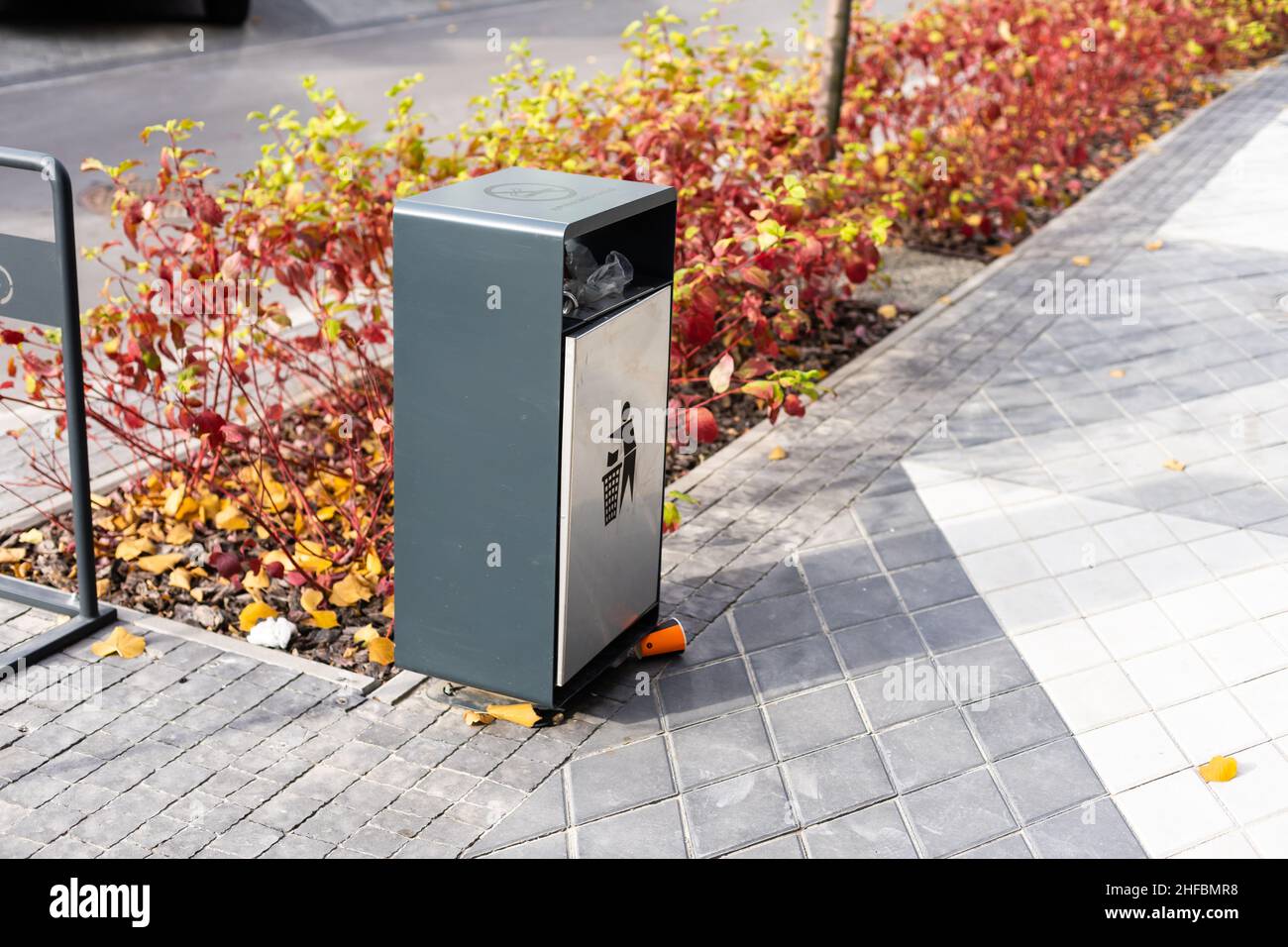 Metal Trash Can with Litter Icon, Black Litter Symbol on Dustbin Stock ...