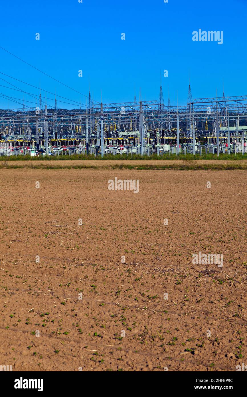 electrical power plant in beautiful colorful meadow Stock Photo - Alamy