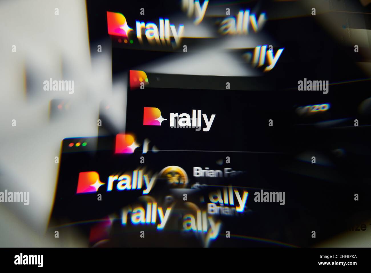 Milan, Italy - January 11, 2022: rally - RLY logo on laptop screen seen through an optical prism ...