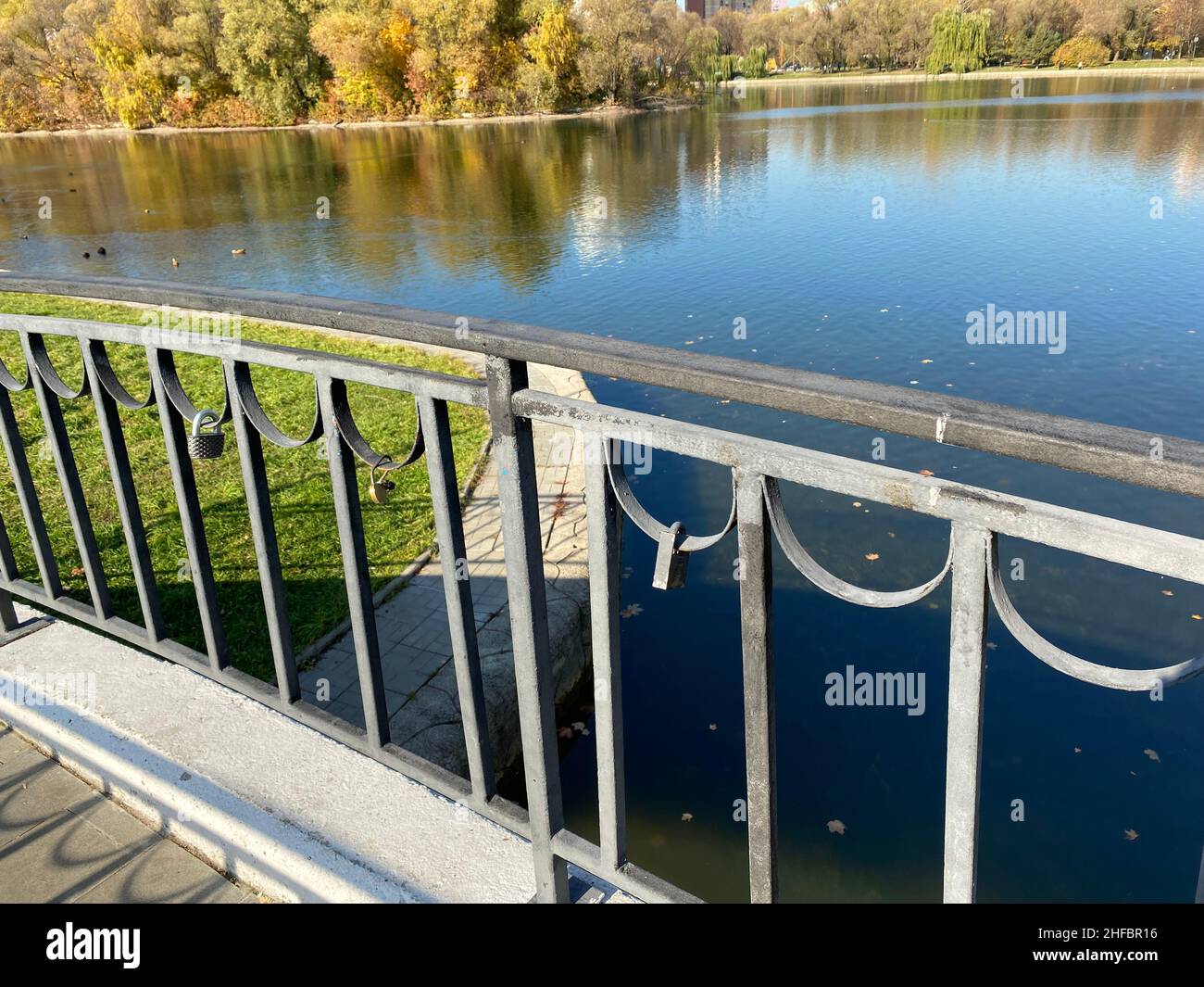 bridge over pond in park at dry sunny autumn day Stock Photo - Alamy