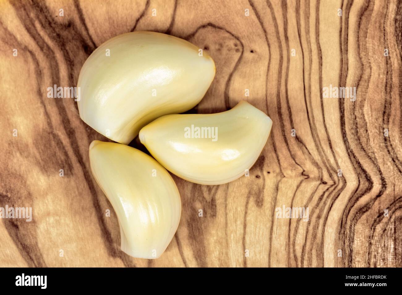 Garlic in vibrant color background Stock Photo - Alamy