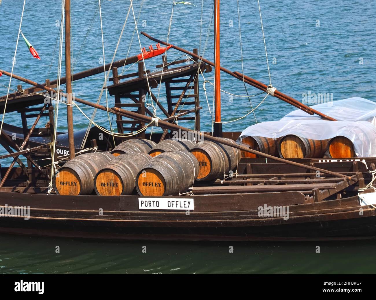 Offley port wine barrels on a boat in Porto in Portugal Stock Photo - Alamy
