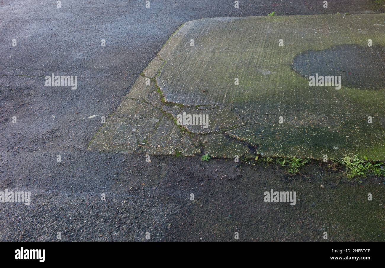 A section of car park with concrete and tarmac Stock Photo - Alamy