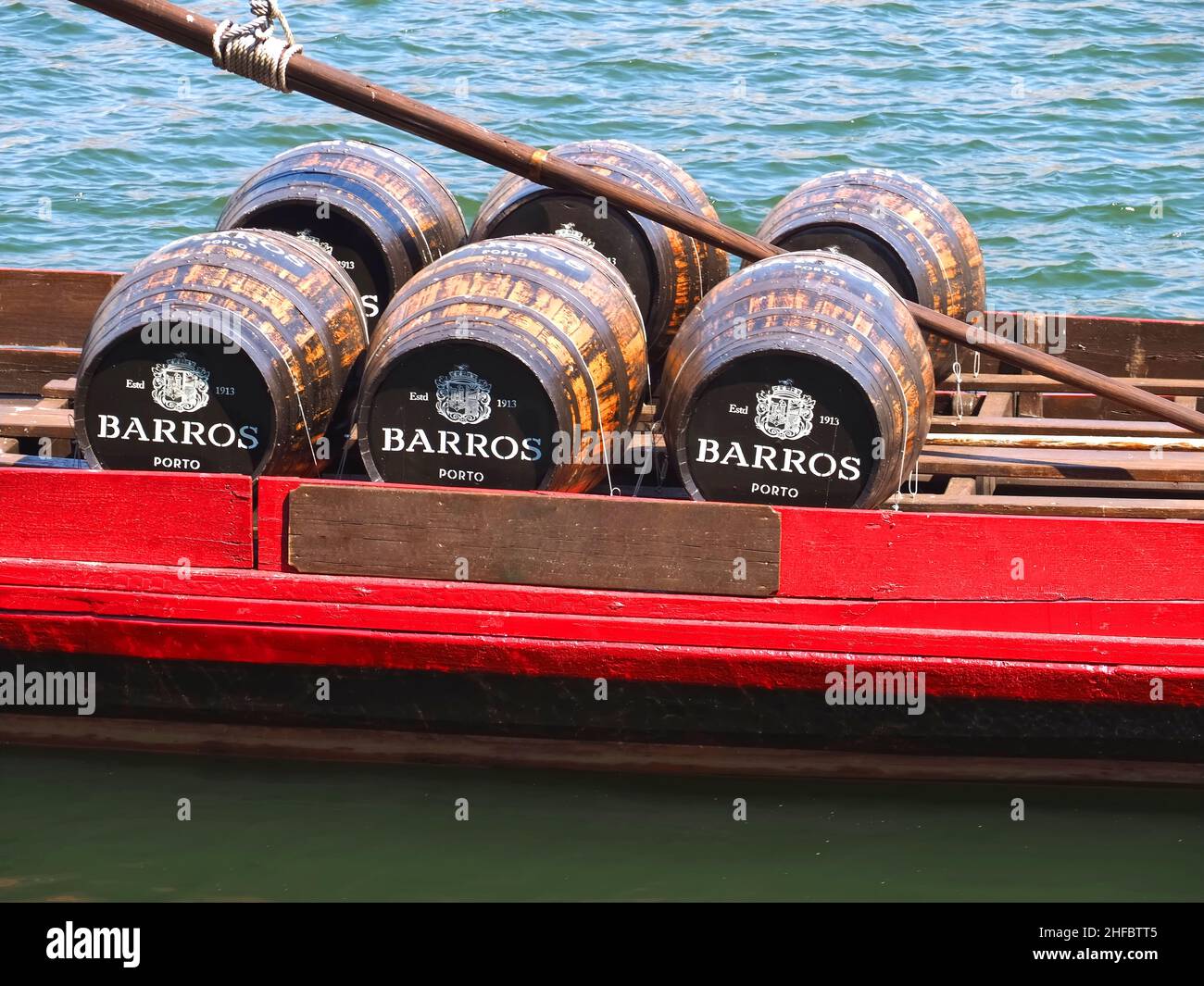 Barros port wine barrels on a boat in Porto in Portugal Stock Photo - Alamy