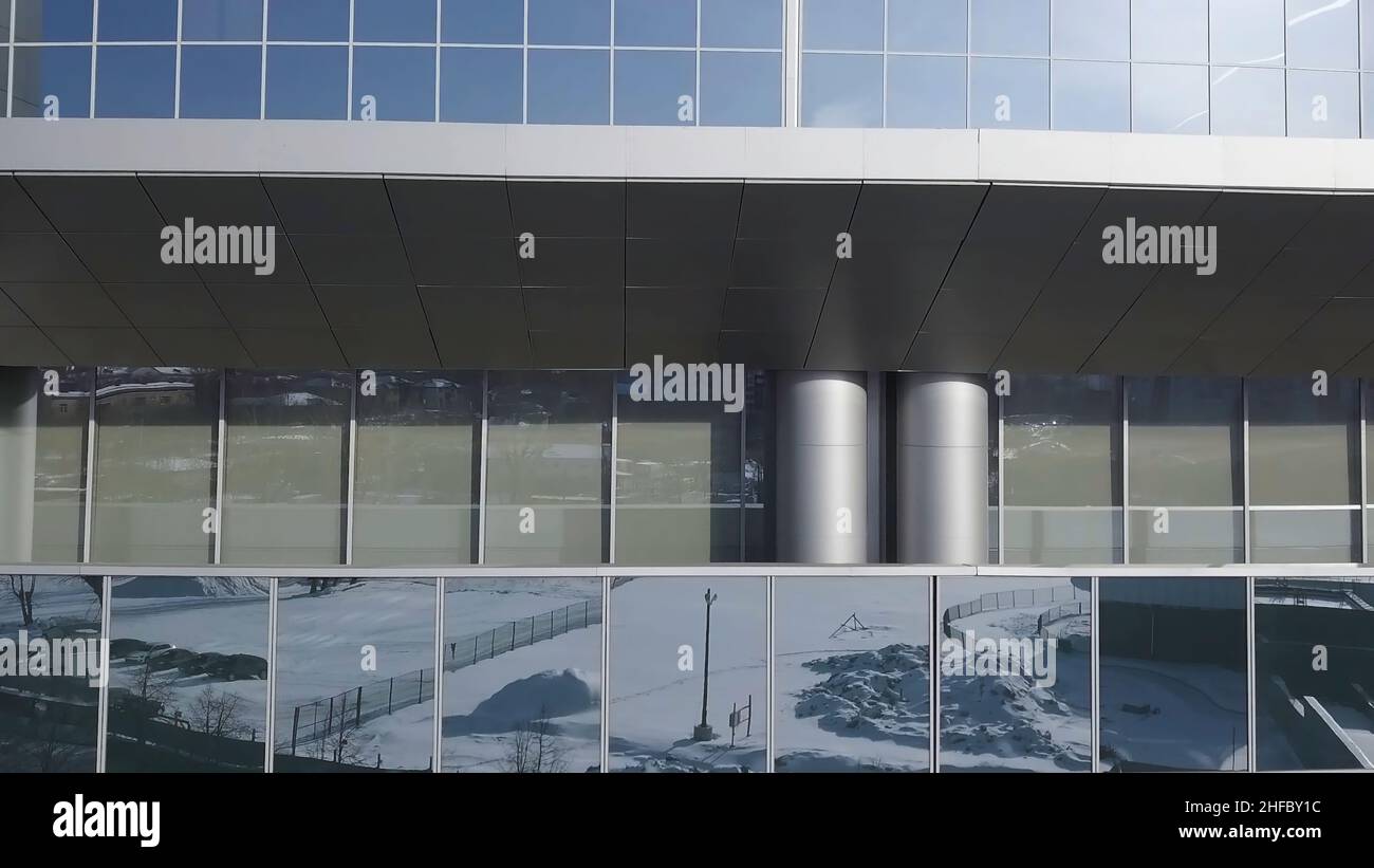 Abstract reflections of tall buildings from glass skyscraper facade ...