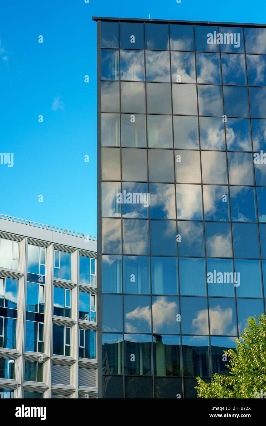 Modern office building with blue windows Stock Photo - Alamy
