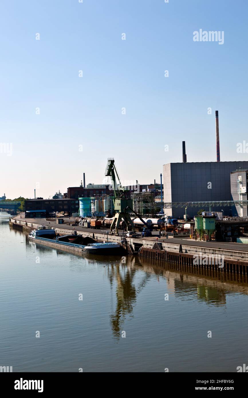 old industrial building at the river Stock Photo - Alamy