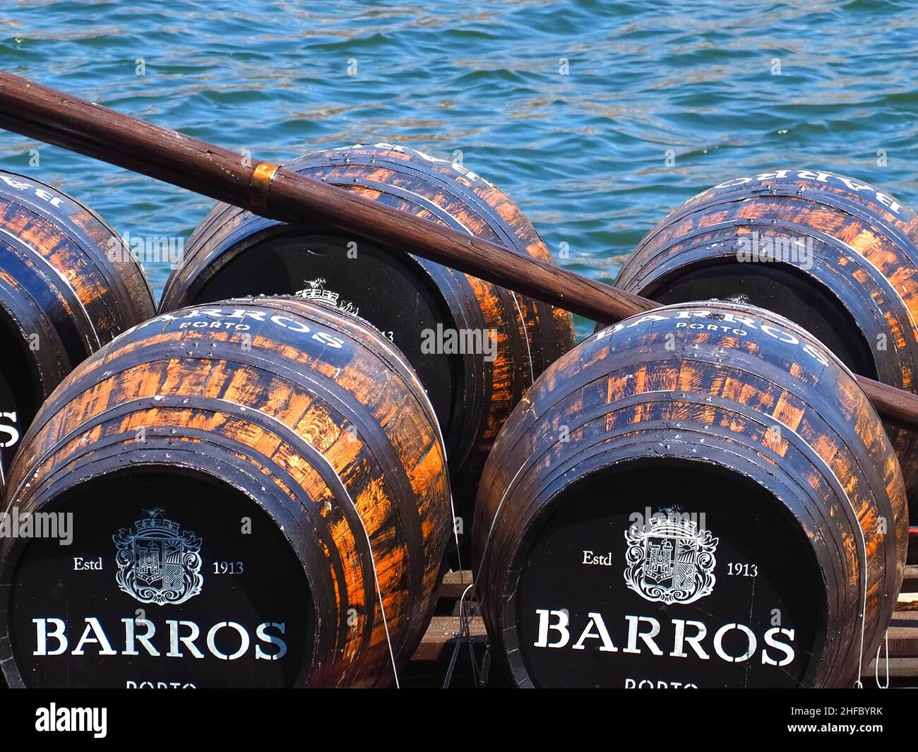 Barros port wine barrels on a boat in Porto in Portugal Stock Photo - Alamy