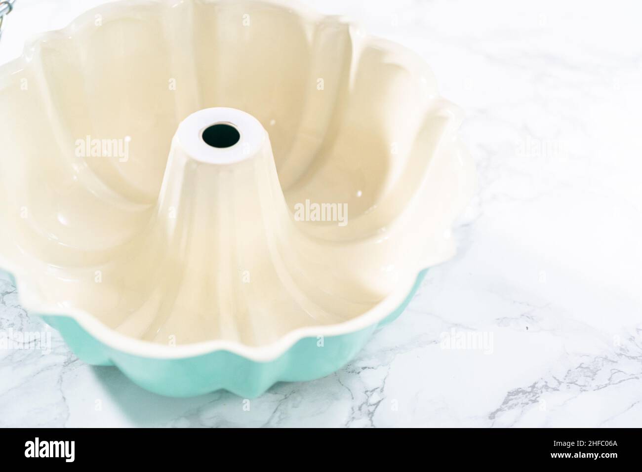 Empty baking pan prepared to bake a lemon pound cake Stock Photo - Alamy