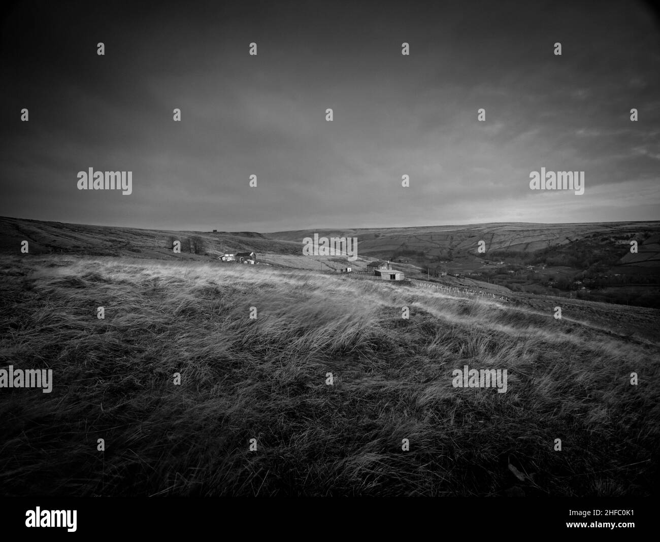 Dawn light on clouds over Buckstones across Hades Farm and Haigh House ...
