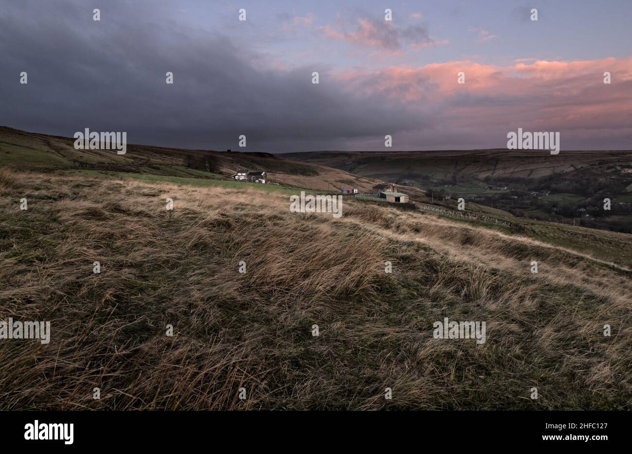 Dawn light on clouds over Buckstones across Hades Farm and Haigh House ...