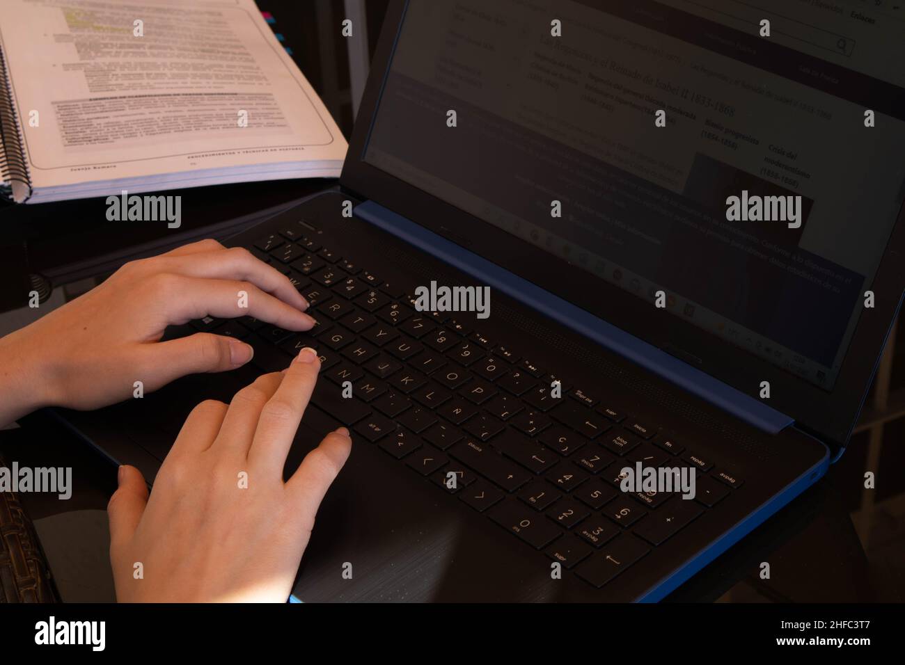 Young girl using computer for homework hi-res stock photography and ...