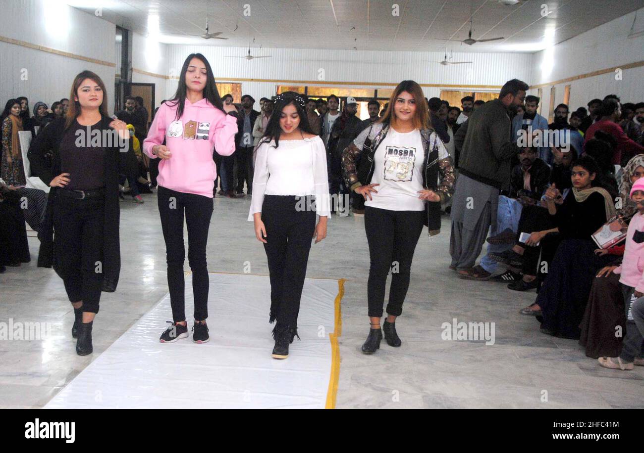Pakistan. 15th Jan, 2022. Models are performing cat walk on ramp during ...