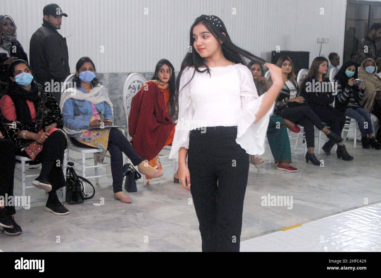 Pakistan. 15th Jan, 2022. Models are performing cat walk on ramp during ...