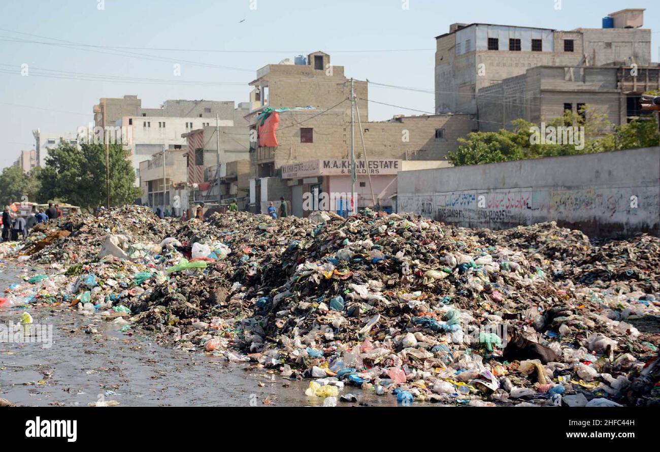 Pakistan. 15th Jan, 2022. Hectic street full of sewerage water and huge ...