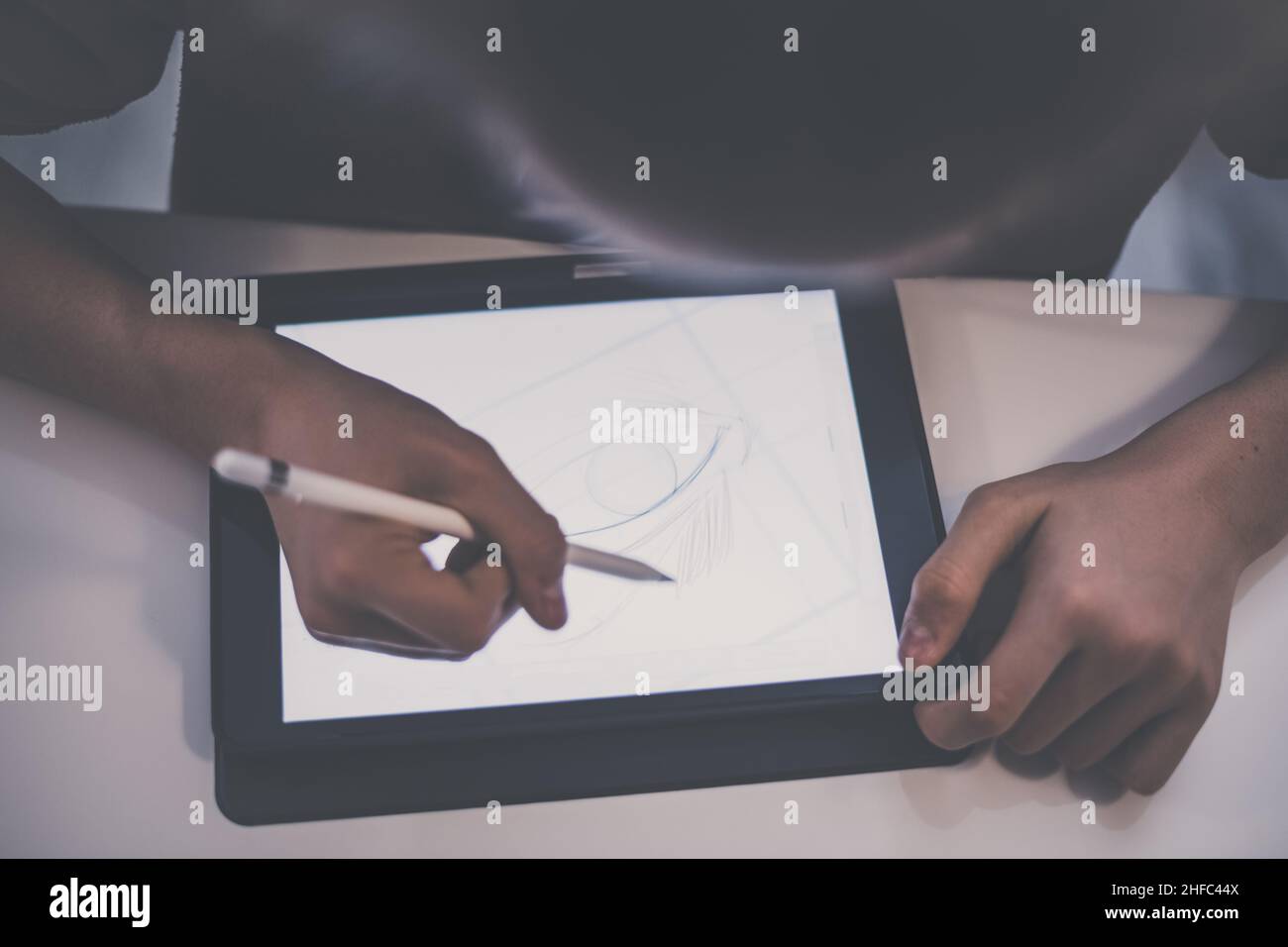 Determined child tablet hi-res stock photography and images - Alamy