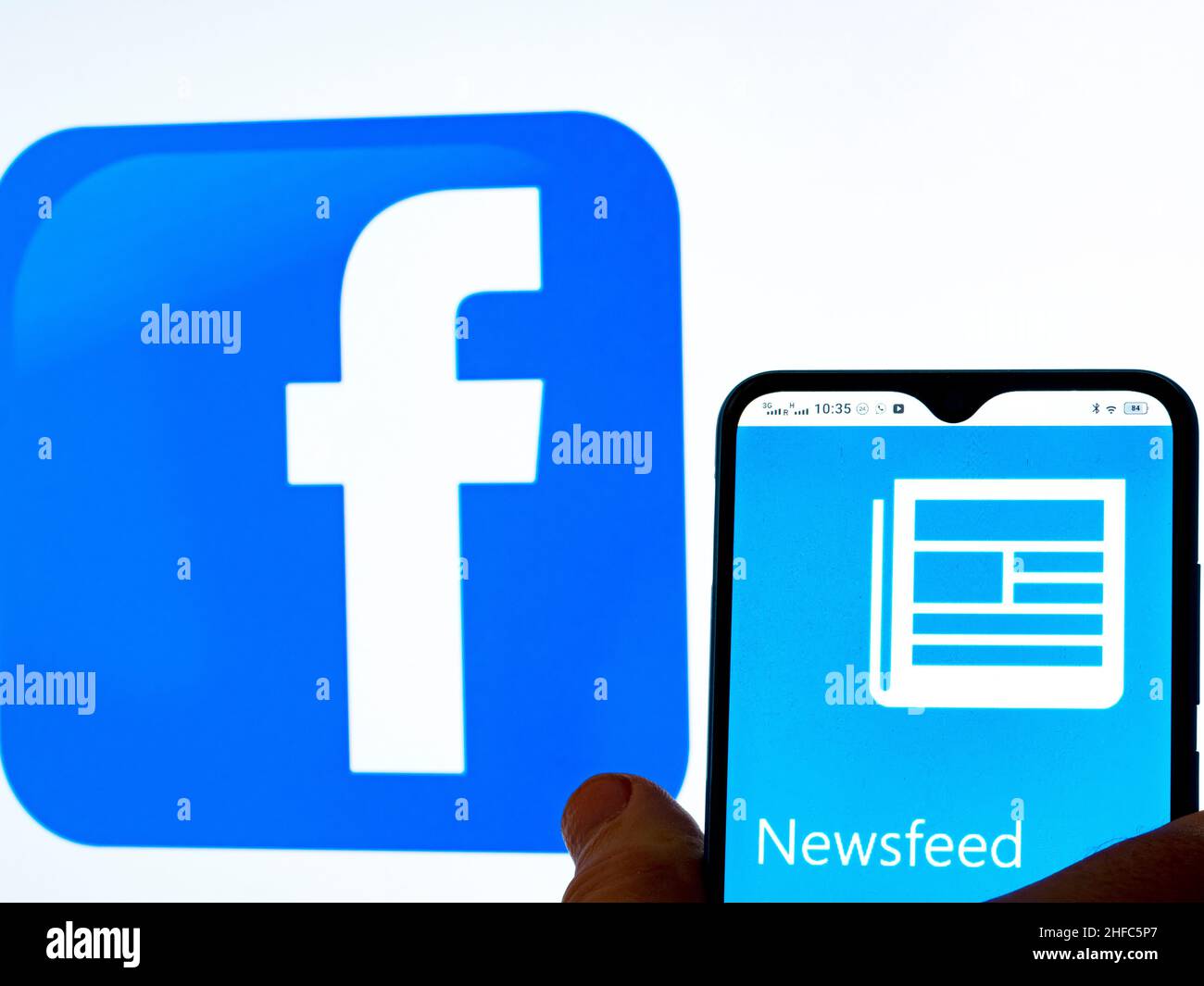 In this photo illustration, the Newsfeed by Facebook logo is seen ...
