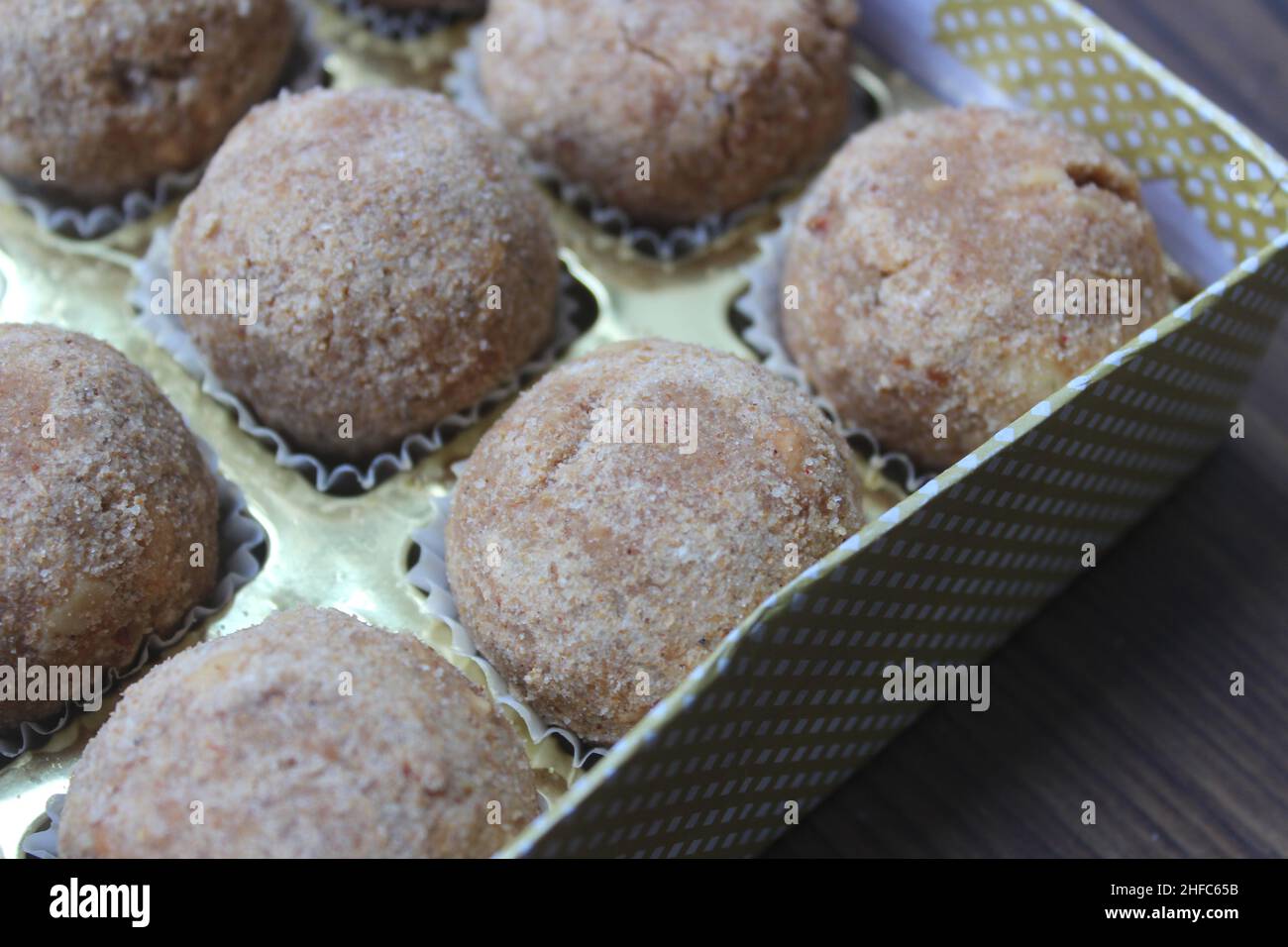 Delicious atta laddoo inside a box closeup Stock Photo - Alamy