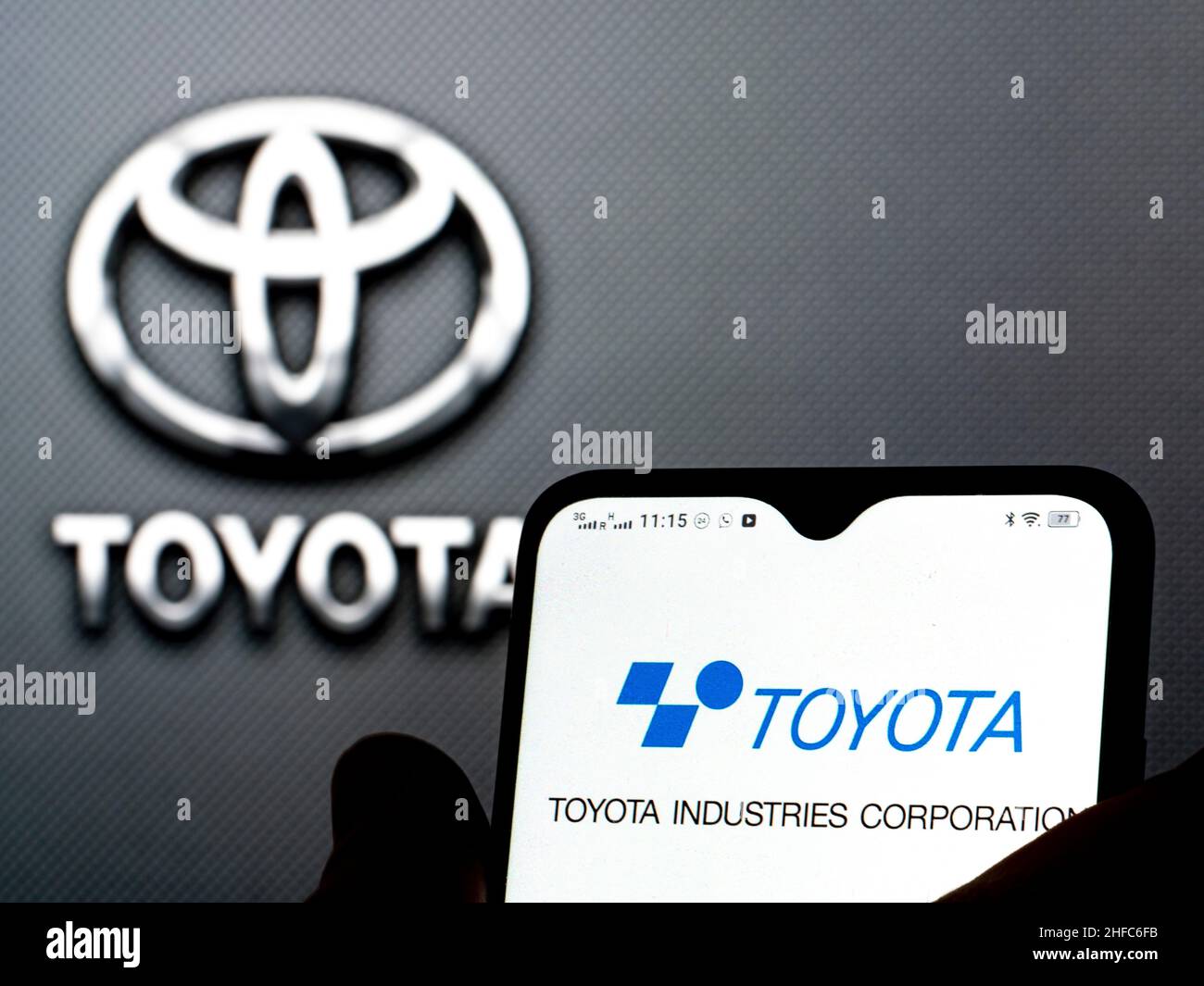 In this photo illustration, the Toyota Industries Corporation part by ...