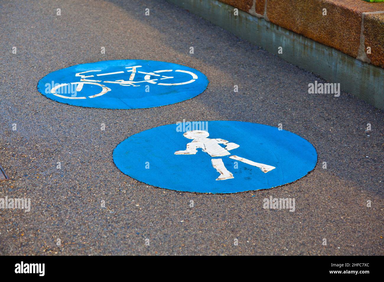 symbol for path and bikelane on asphalt Stock Photo - Alamy