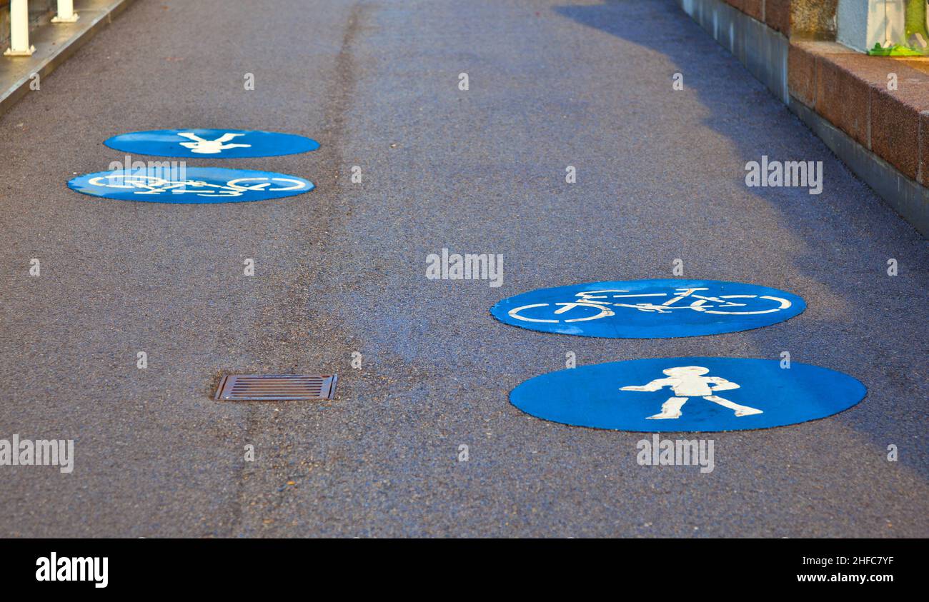 symbol for path and bikelane on asphalt Stock Photo - Alamy