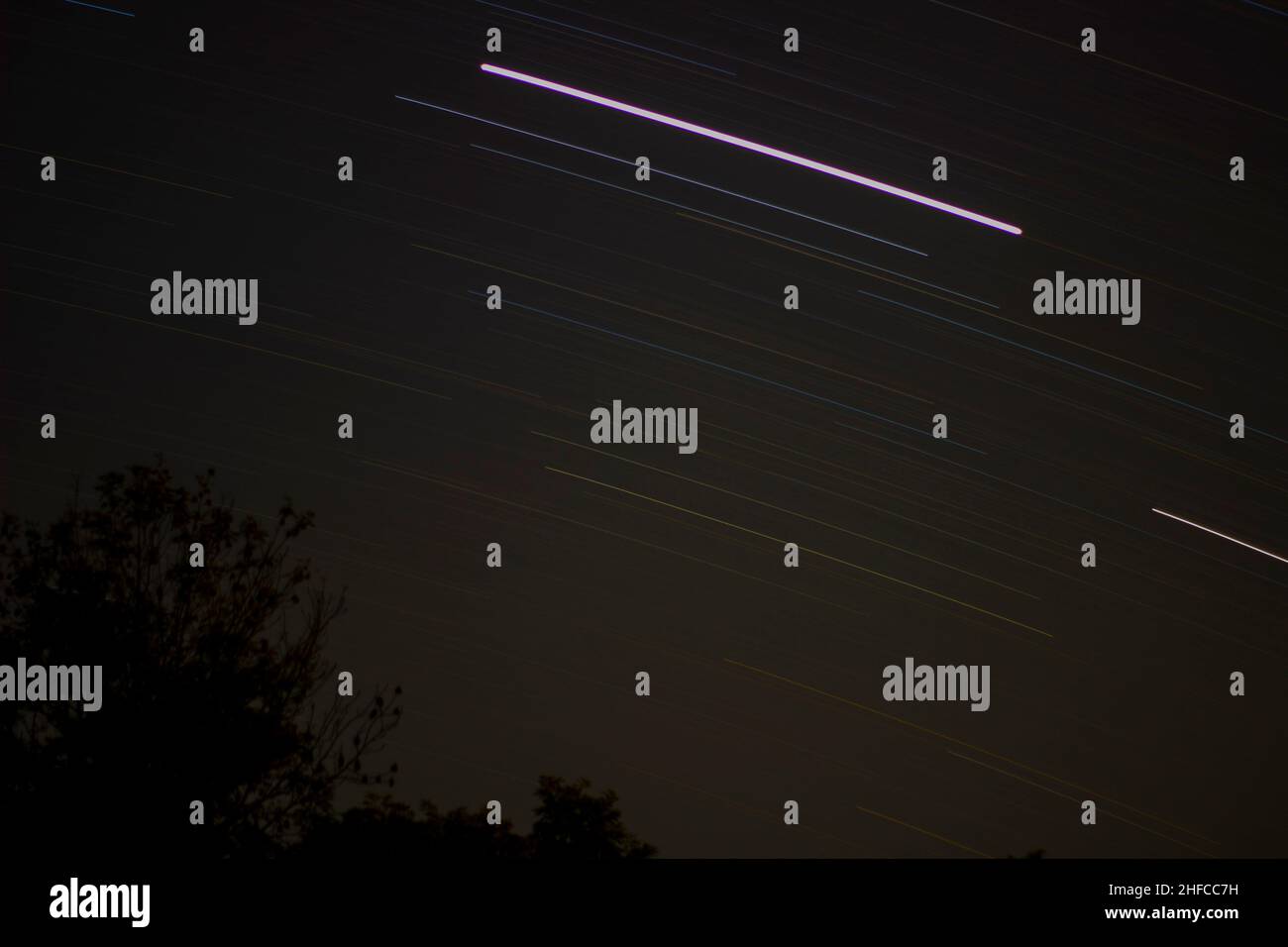 The movement of stars in the night sky Stock Photo - Alamy