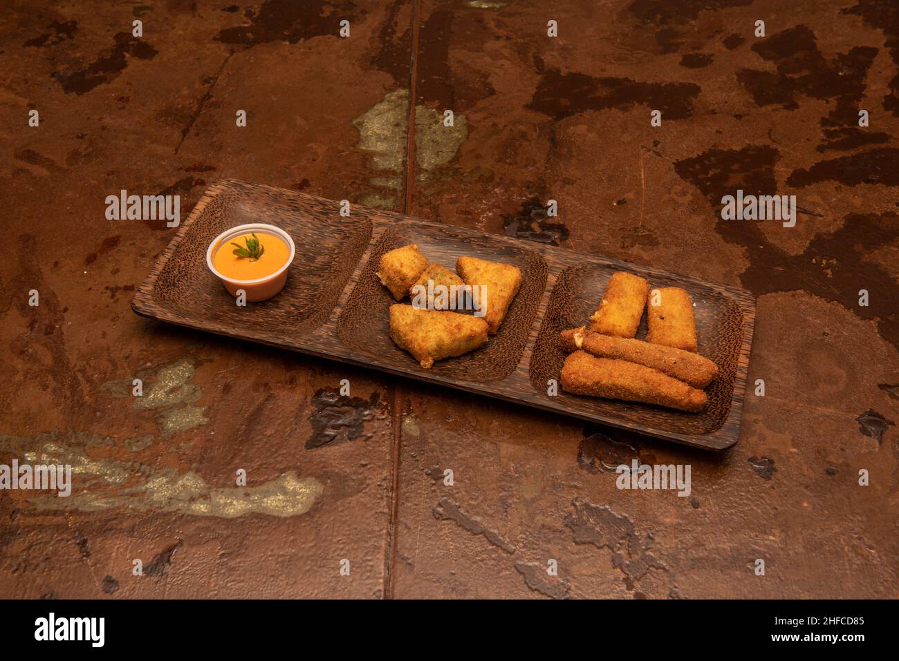 Fried Battered Cheese Appetizers with Dipping Sauce Stock Photo - Alamy